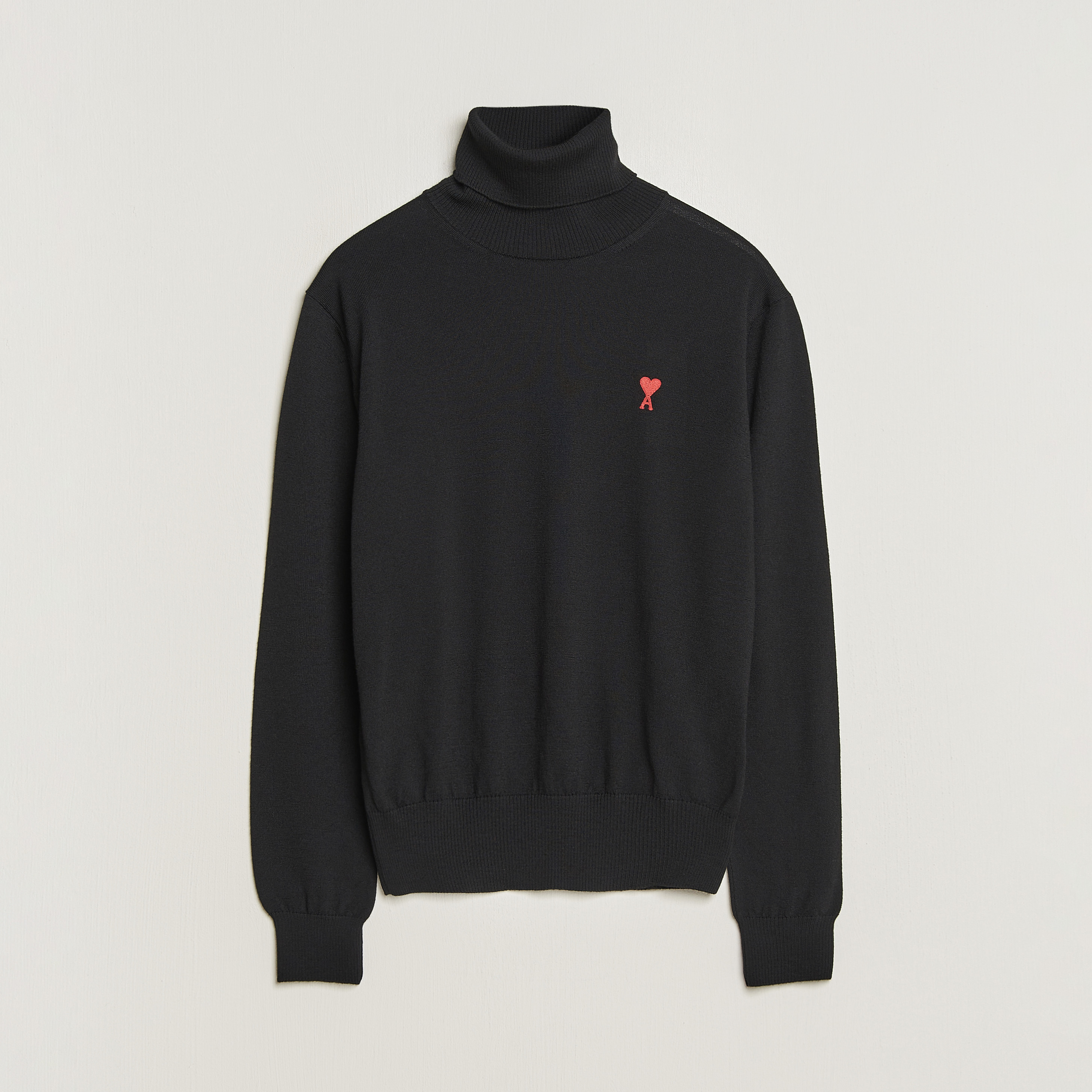 AMI Heart Logo Wool Turtleneck Black osoitteesta CareOfCarl.fi